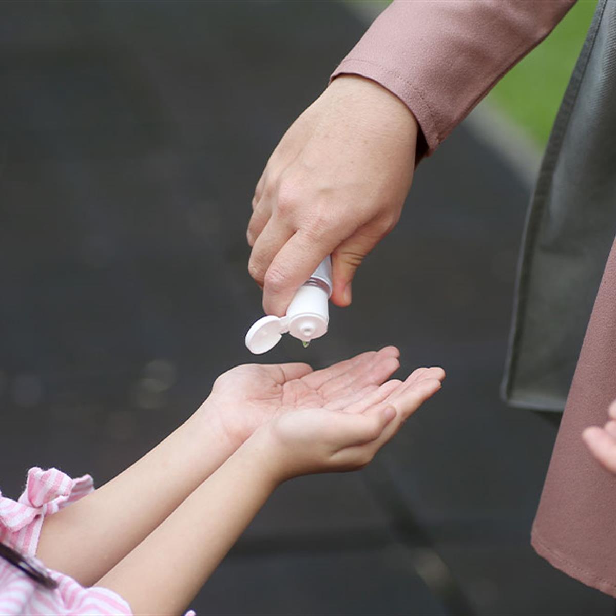 Kids Using Hand Sanitizer